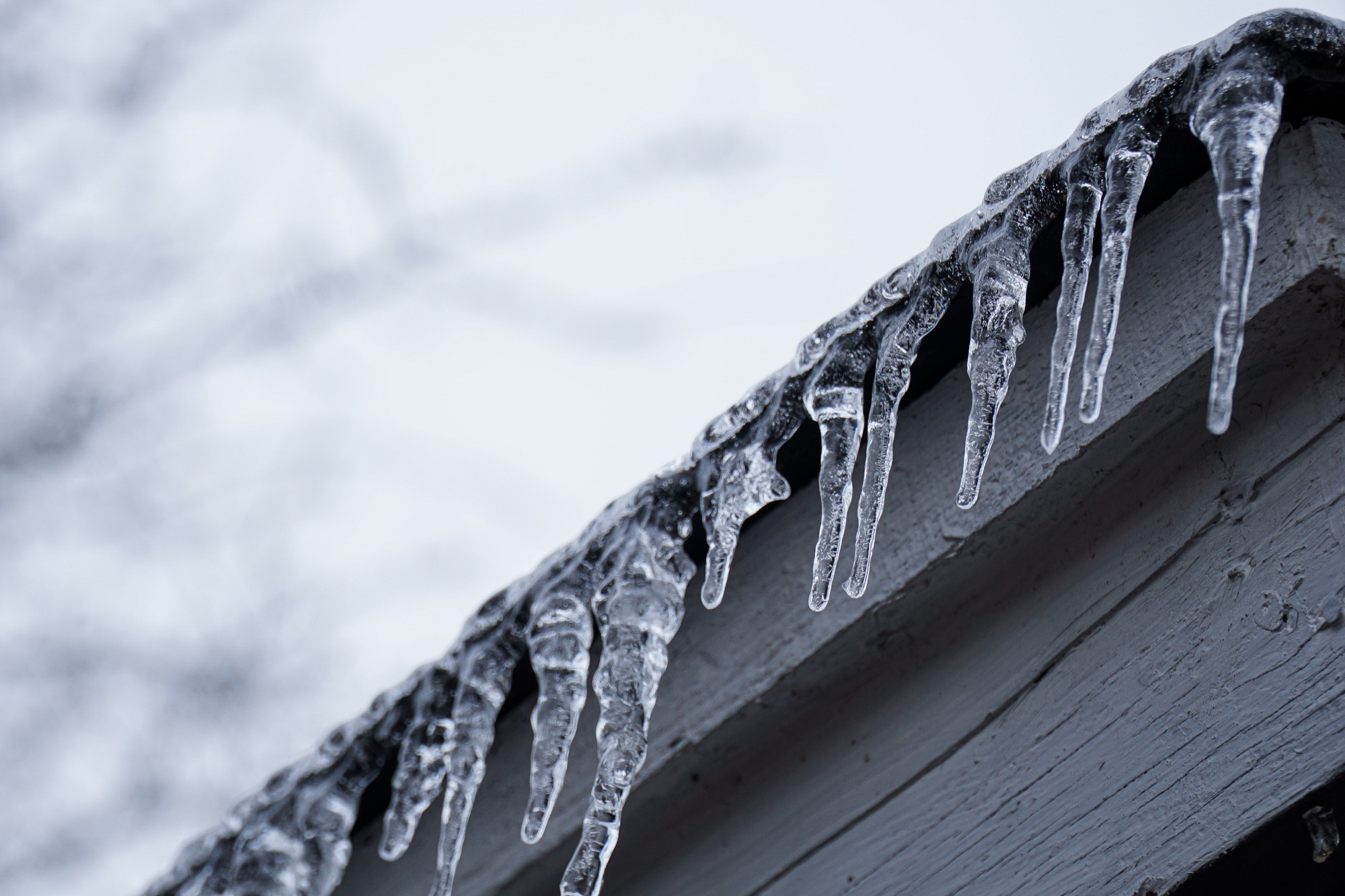 Ice Dams on Your Roof: What it Means & How to Deal with Them - A & J ...